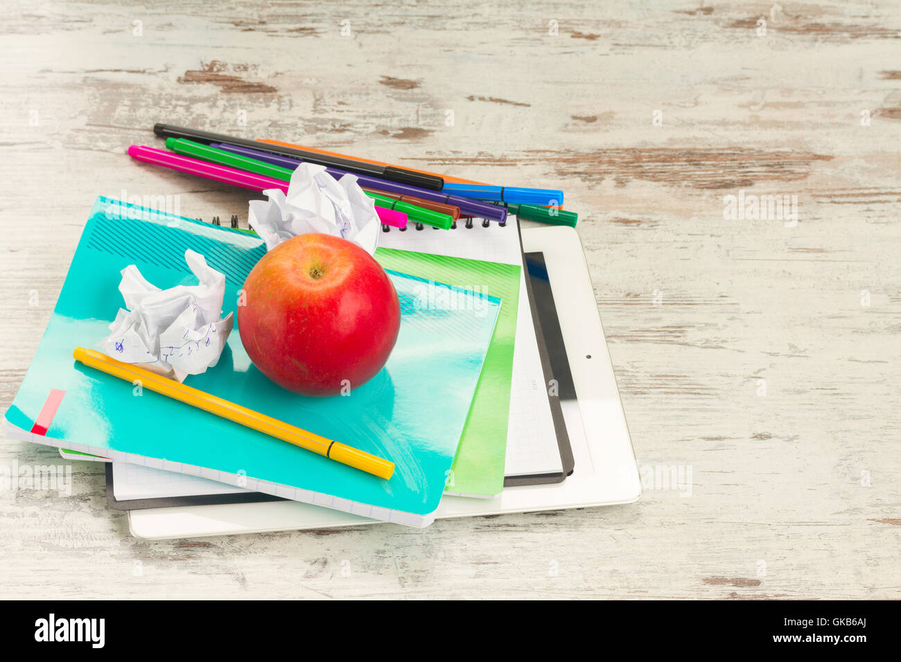 Apple with school supplies Stock Photo - Alamy