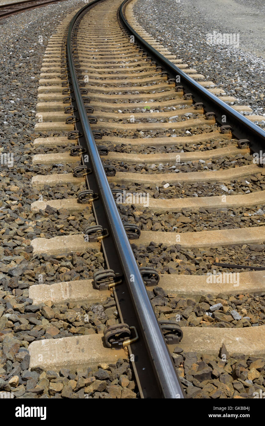 Closeup of a modern set of curving train tracks Stock Photo - Alamy