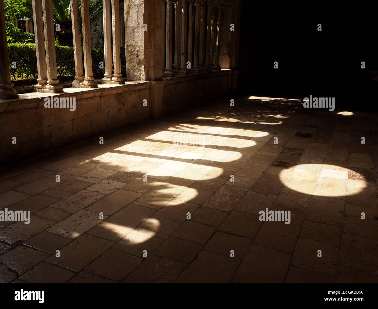 shadows cast in the cloisters of the Franciscan Monastery in the walled ...