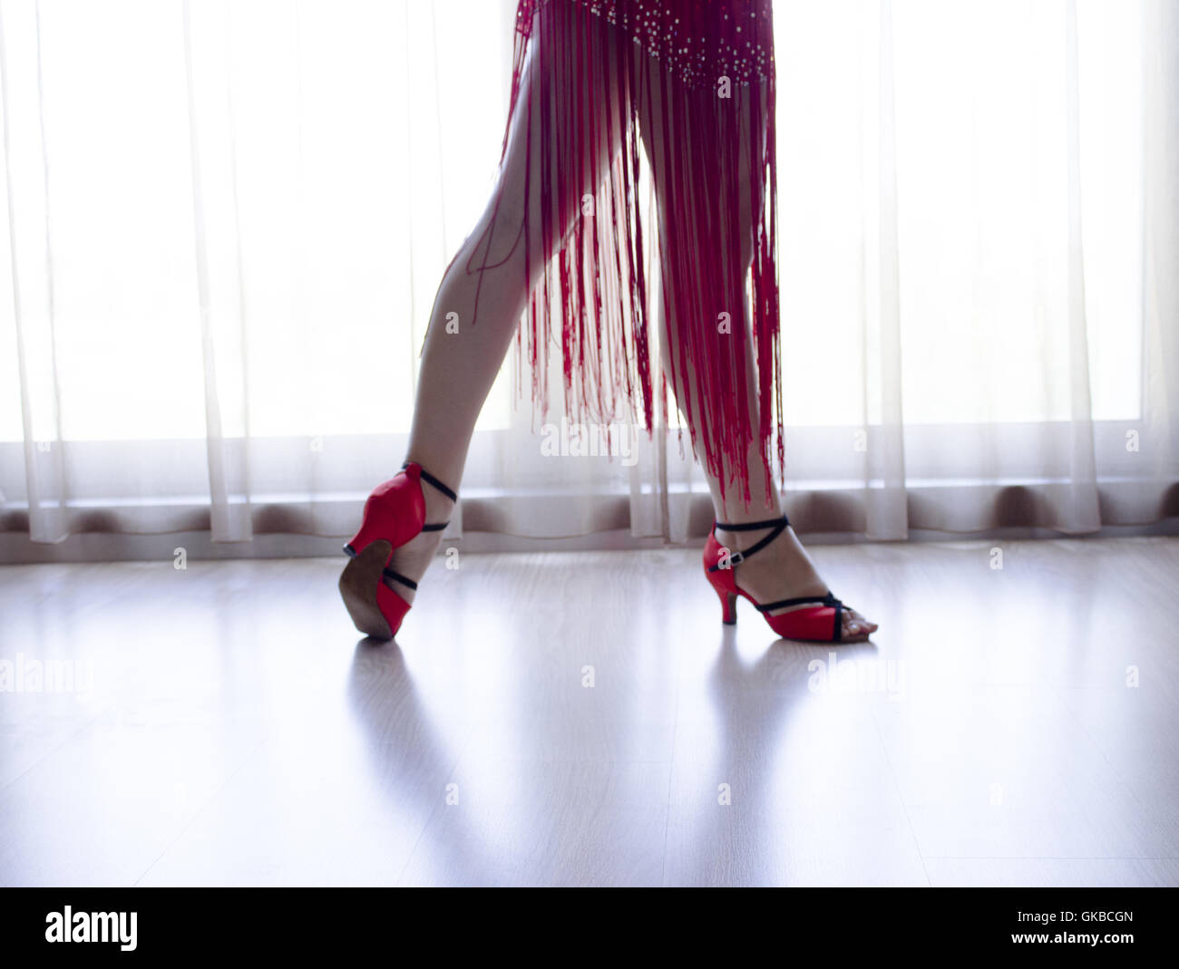 Woman dancing latin rhythms Stock Photo - Alamy