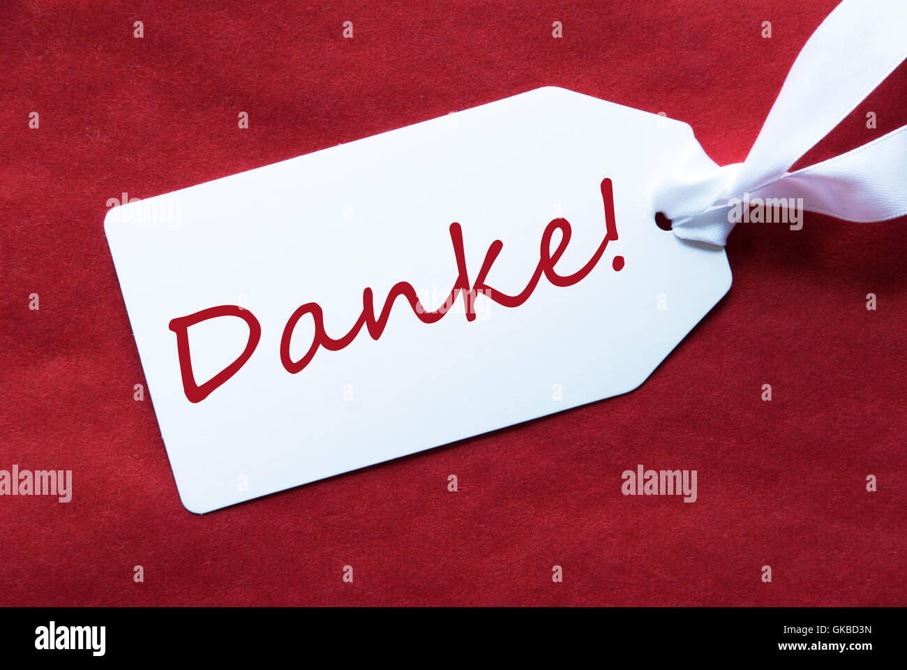 One Label On Red Background, Danke Means Thank You Stock Photo - Alamy