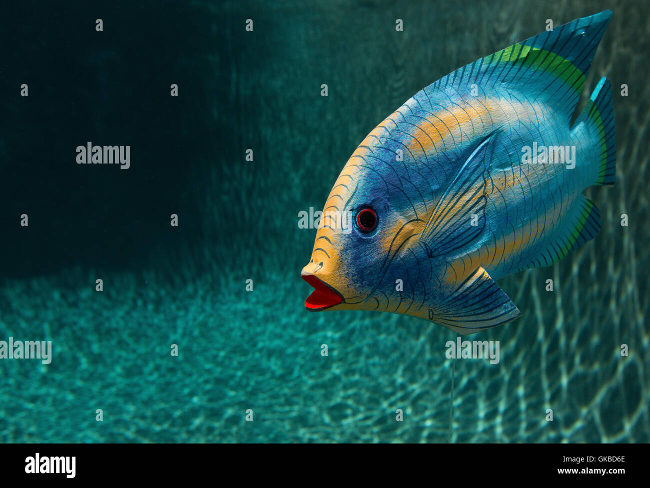 Wood wooden fish carving hi-res stock photography and images - Alamy