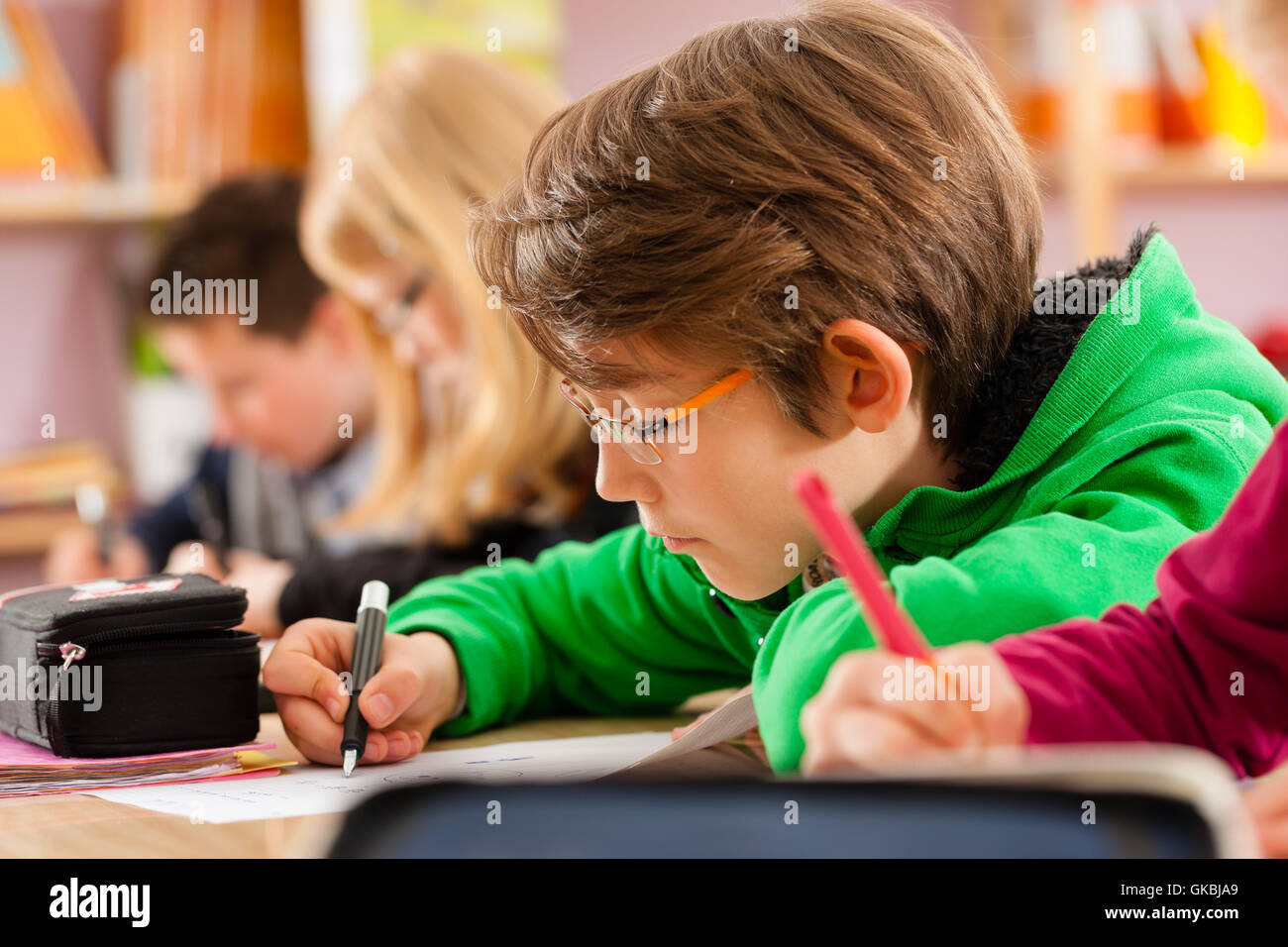 students in the school to do homework Stock Photo - Alamy