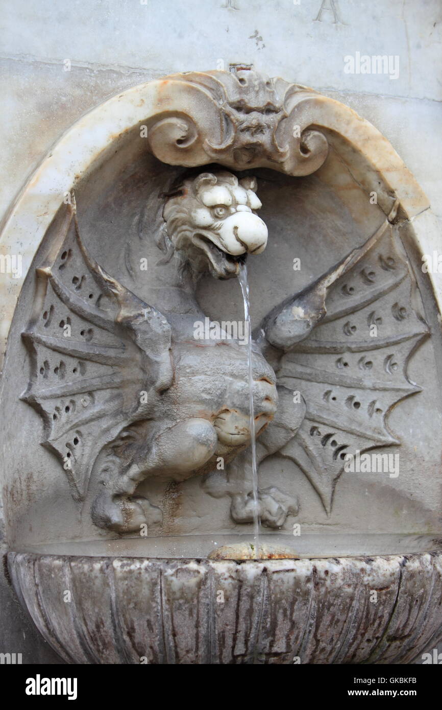 Fountain with a dragon statue located in Rome, Italy Stock Photo - Alamy