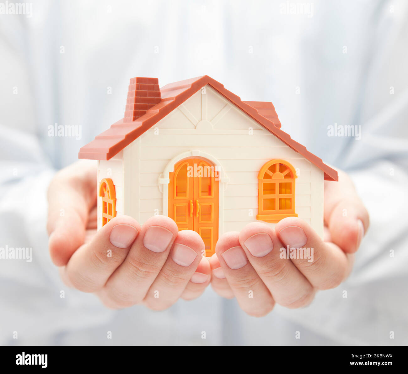 house building hand Stock Photo - Alamy