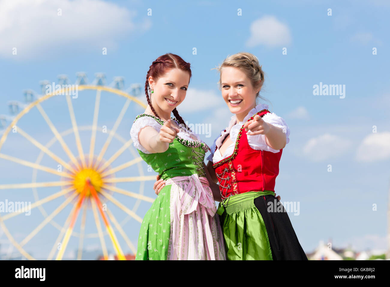 young women at the spring festival in a traditional dirndl Stock Photo ...
