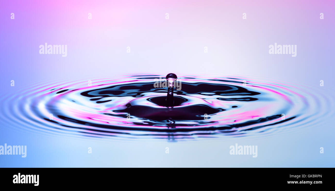 mirroring milk water drop Stock Photo - Alamy