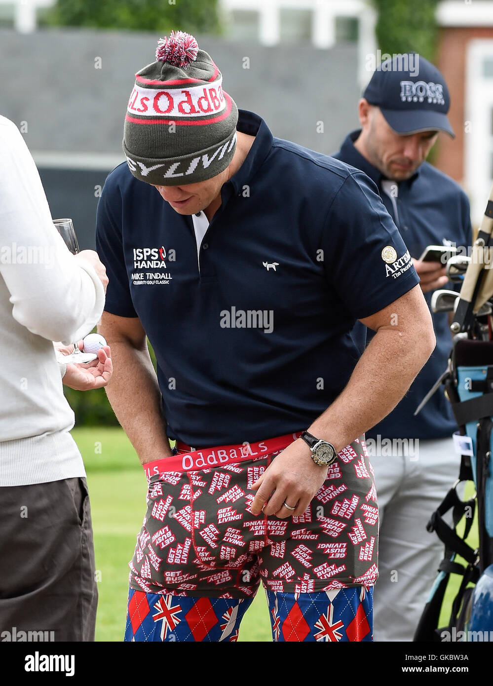 Mike Tindall playfully wears charity boxer shorts at his celebrity golf ...