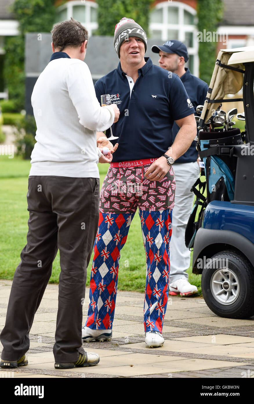 Mike Tindall playfully wears charity boxer shorts at his celebrity golf ...