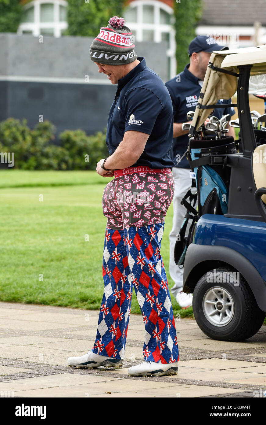 Mike Tindall playfully wears charity boxer shorts at his celebrity golf ...