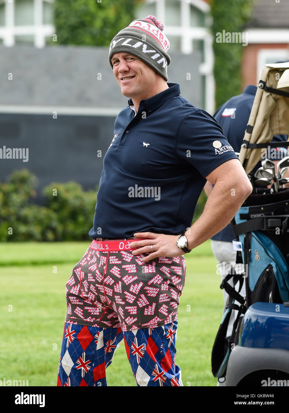 Mike Tindall playfully wears charity boxer shorts at his celebrity golf ...