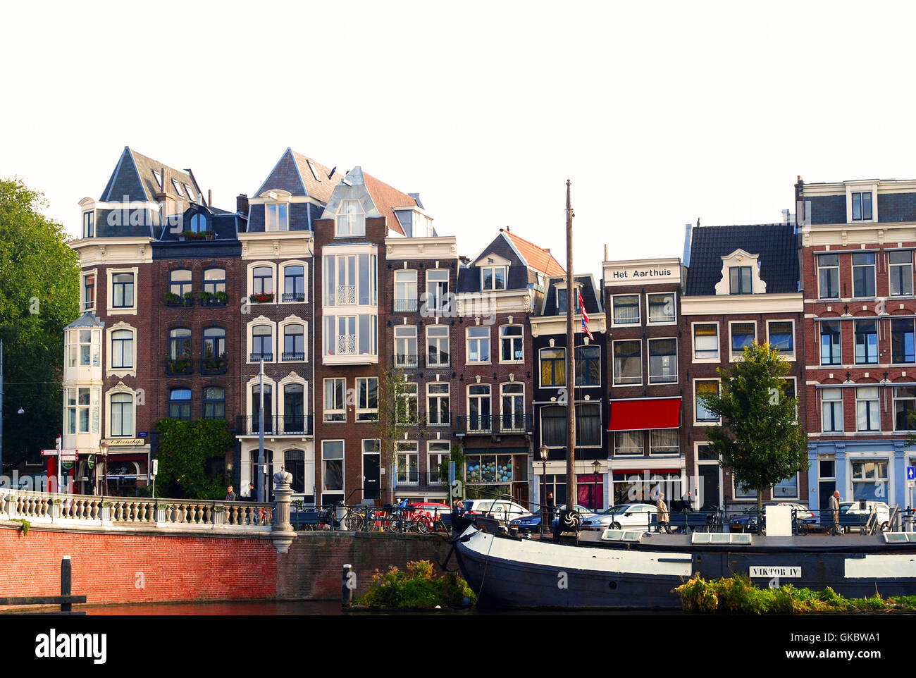 A row of traditional dutch buildings in Amsterdam on a canal, October ...