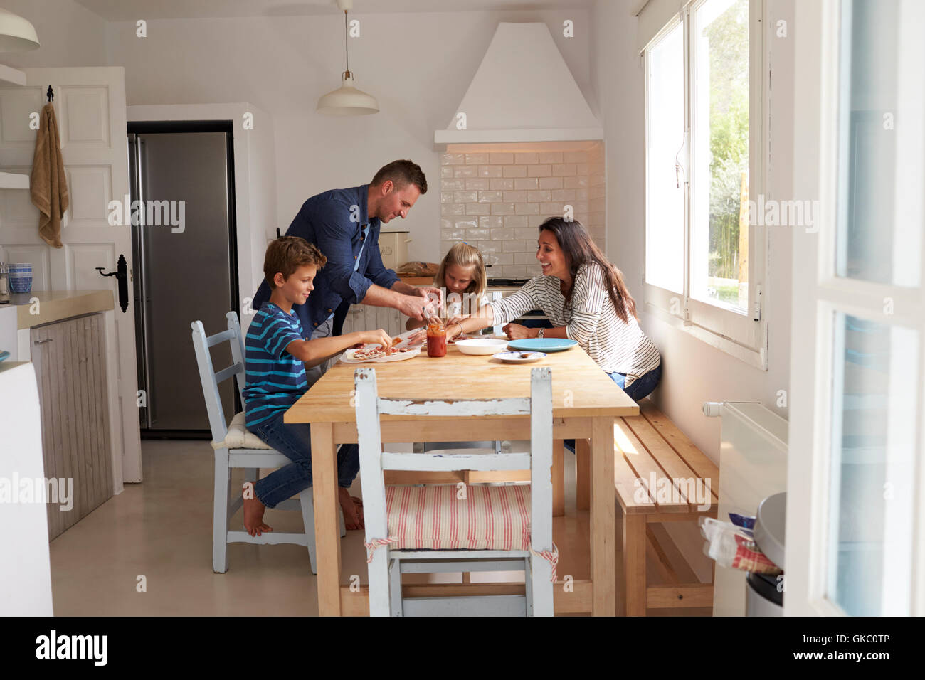 Father son making pizza in hi-res stock photography and images - Alamy
