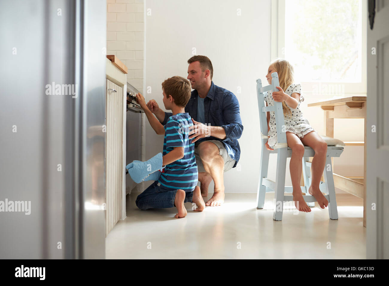 Father son making pizza in hi-res stock photography and images - Alamy