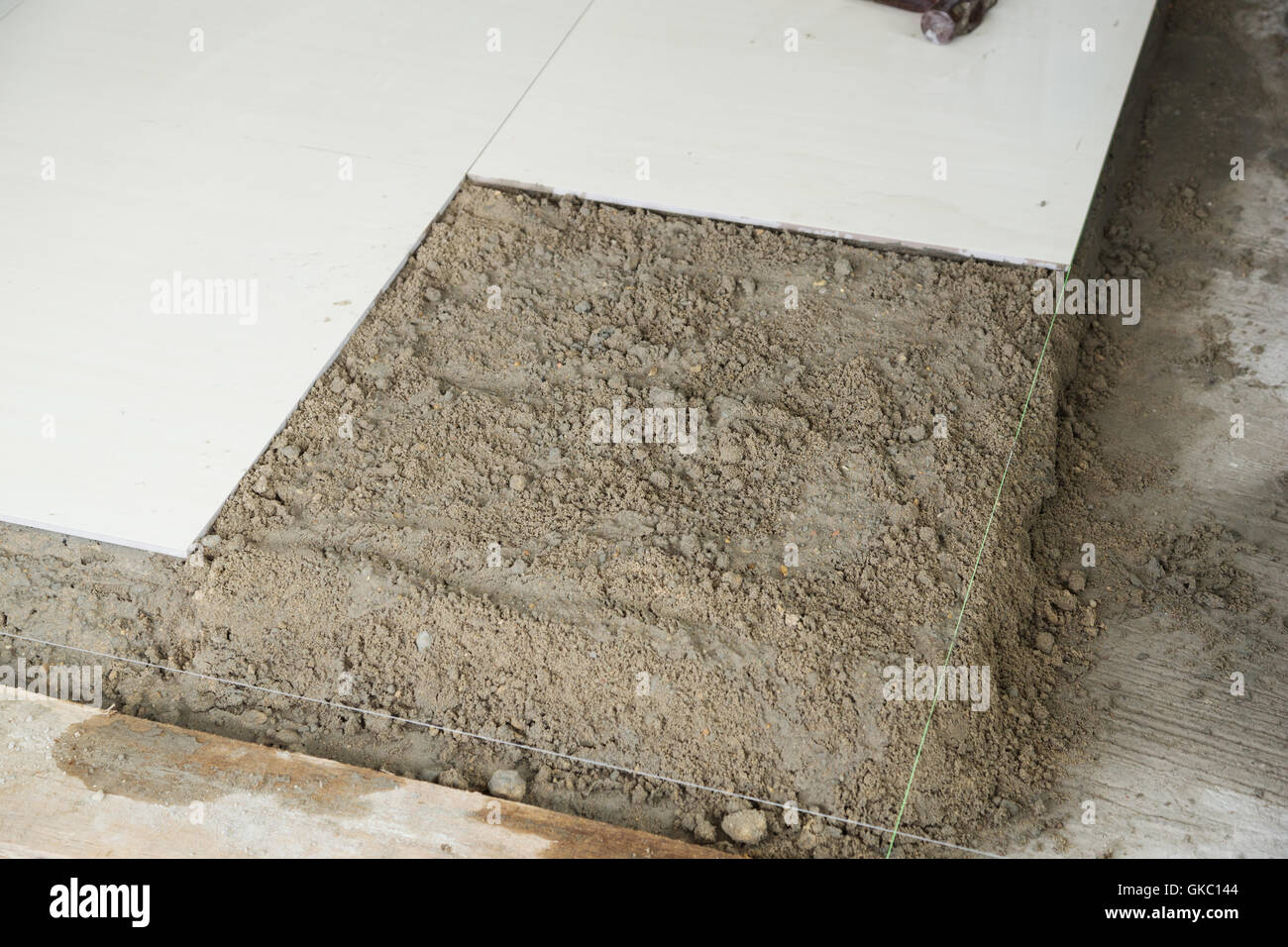 Installing floor tile hi-res stock photography and images - Alamy