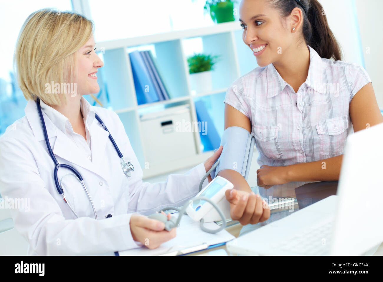 Kind smiling doctor put hi-res stock photography and images - Alamy