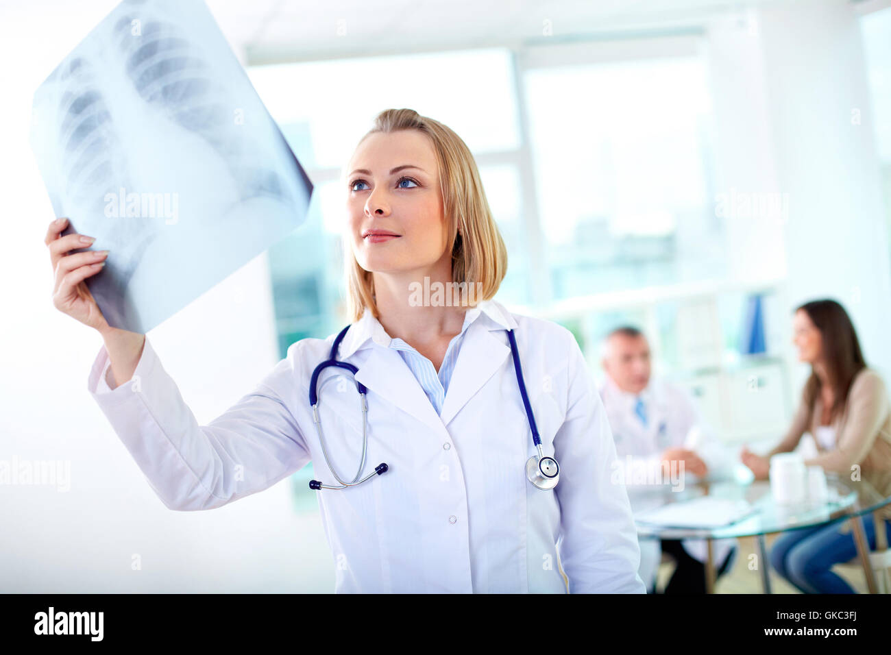 Medical female doctor study xray hi-res stock photography and images ...