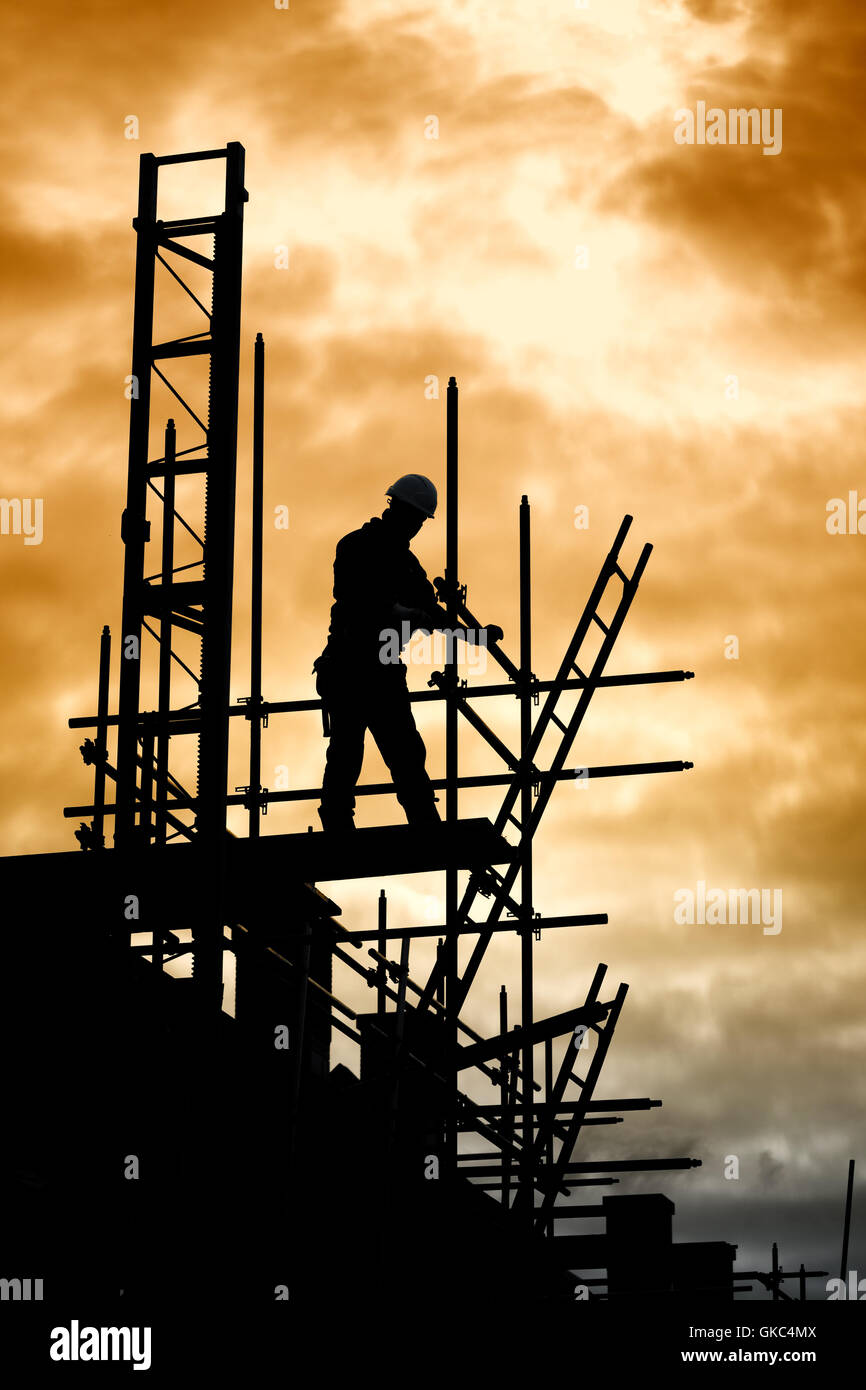 Silhouette construction crane scaffolding hi-res stock photography and ...