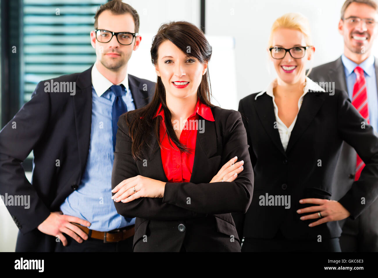 business - a group of businessmen in an office Stock Photo - Alamy