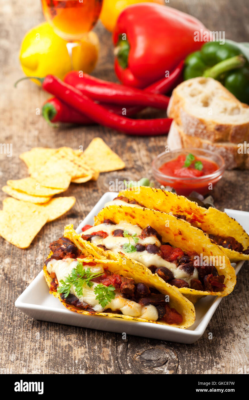 give taco with chili con carne in a bowl Stock Photo - Alamy