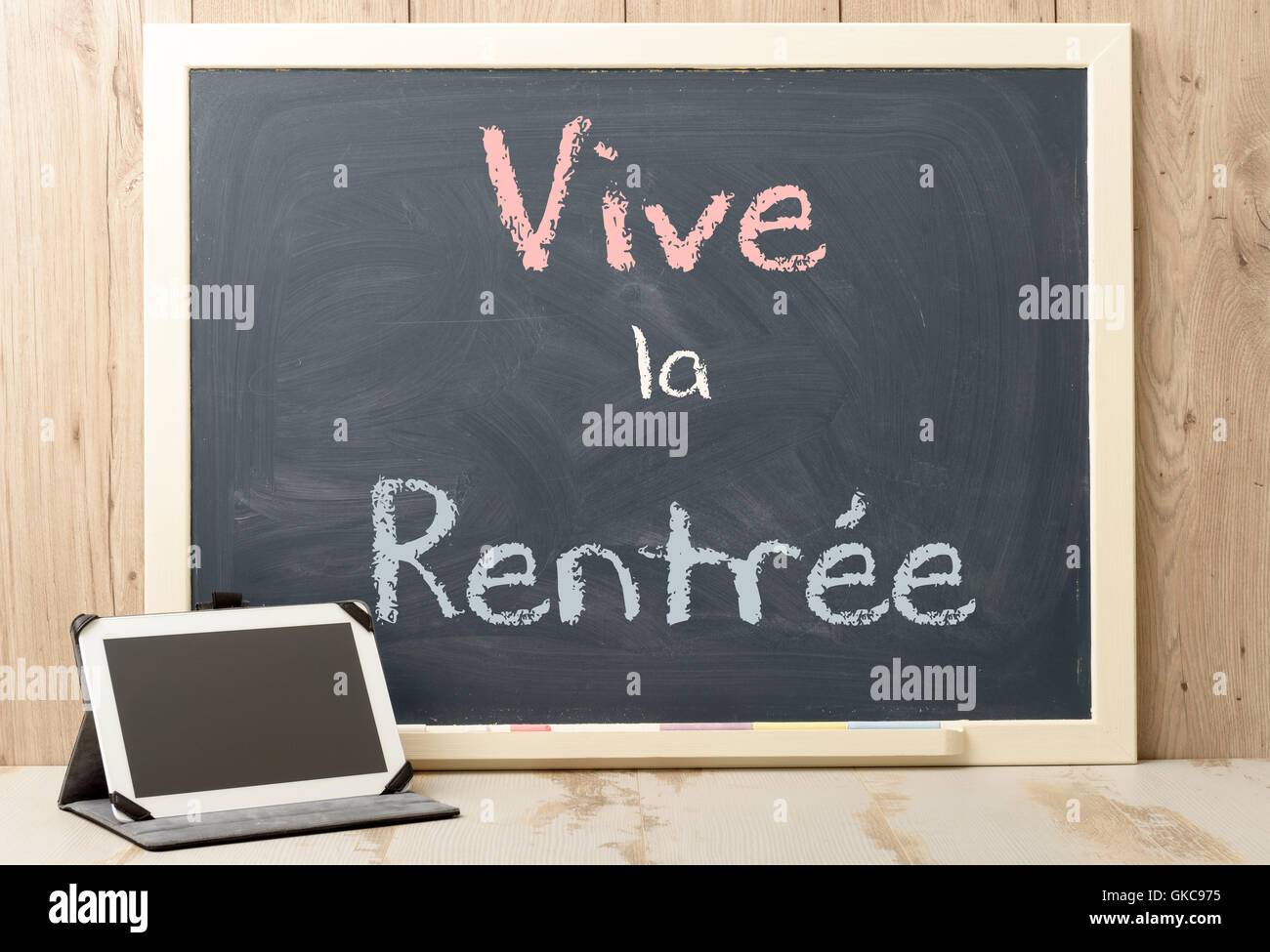 " vive la rentree" back to school written on blackboard and tablet ...