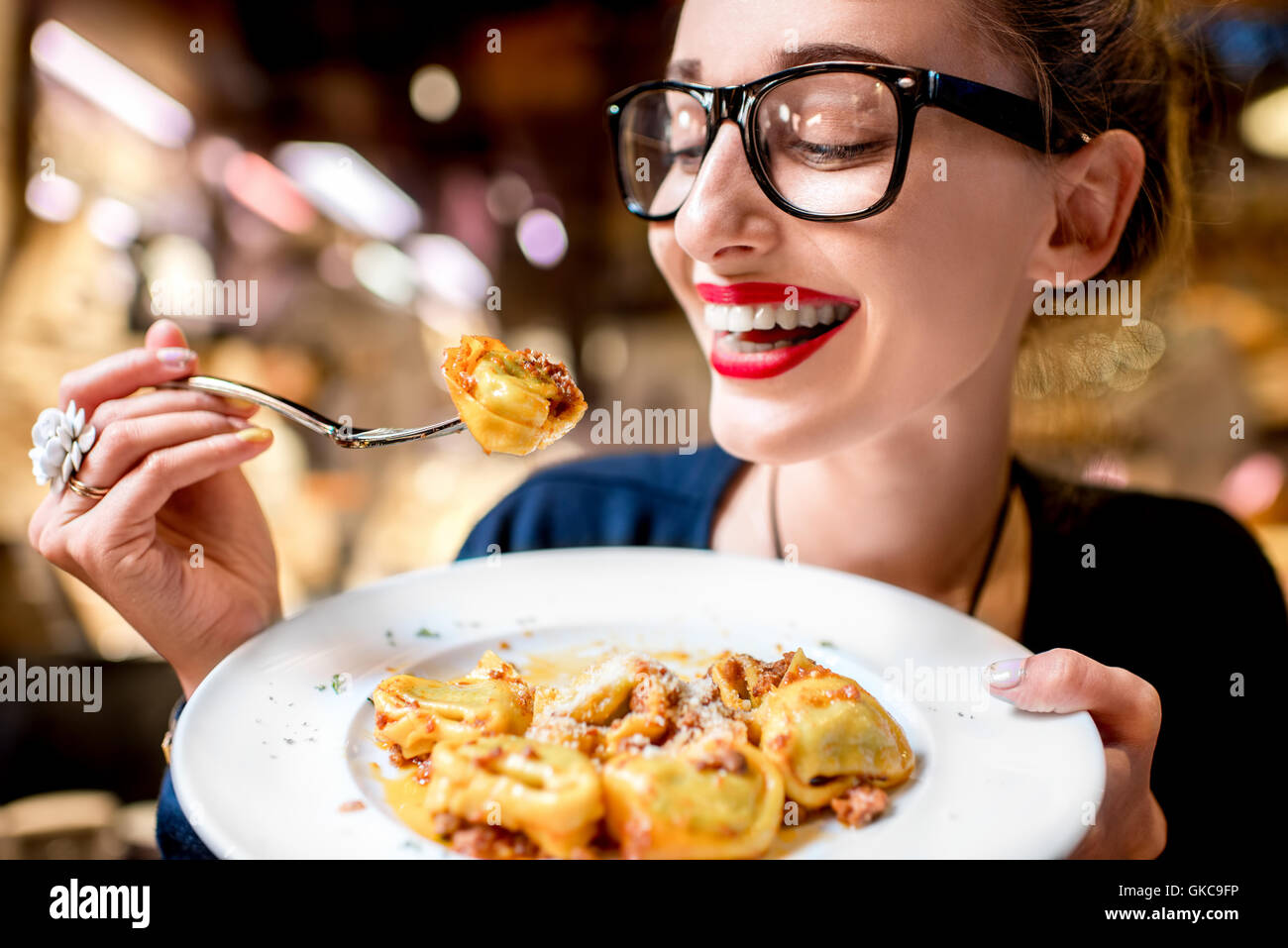 Young people eating pasta hi-res stock photography and images - Alamy