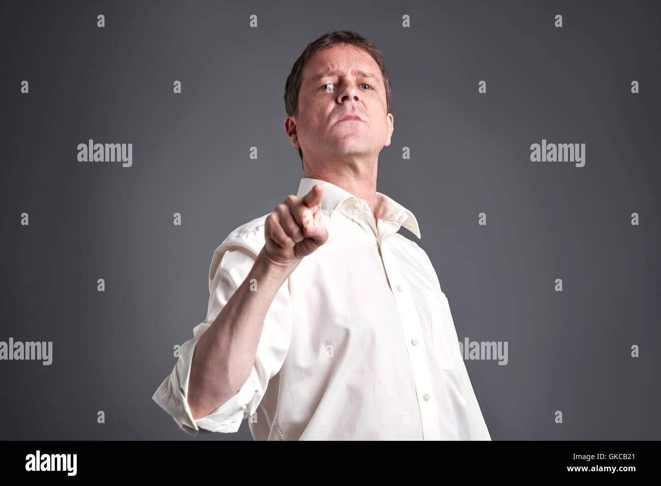 Portrait of a angry middle age man getting fury Stock Photo - Alamy