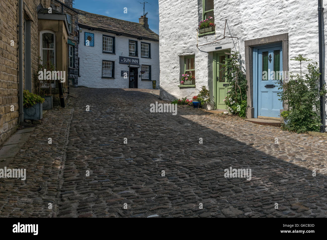 The Main Street in Dent looking towards The Sun Inn Stock Photo - Alamy