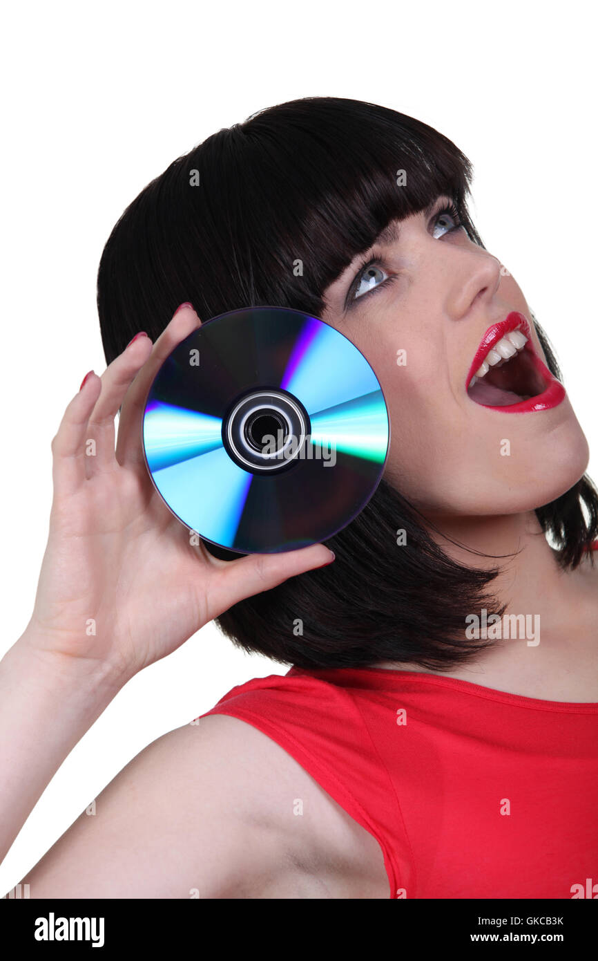 woman listen concert Stock Photo - Alamy