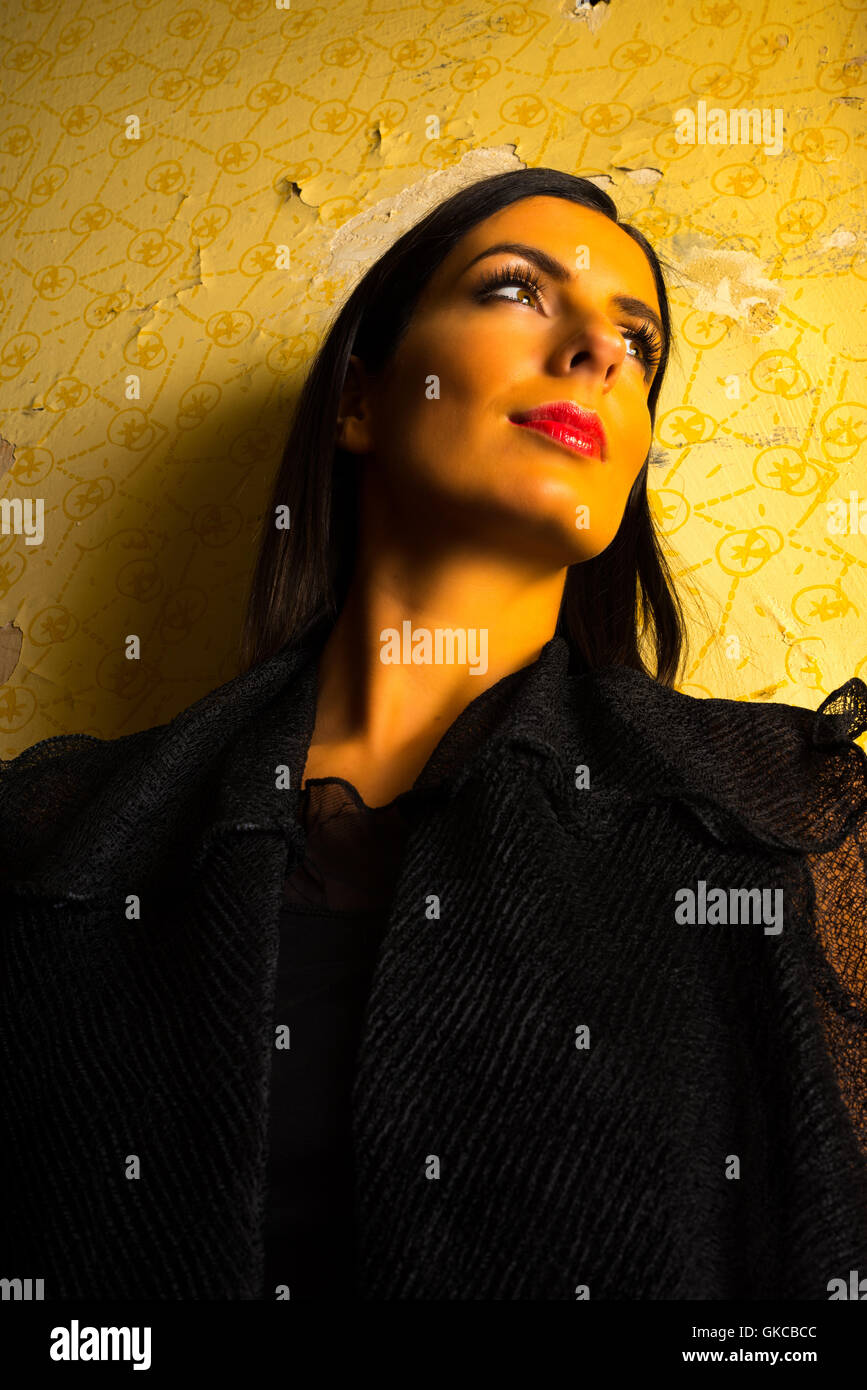 Portrait of a beautiful young woman in golden light Stock Photo - Alamy