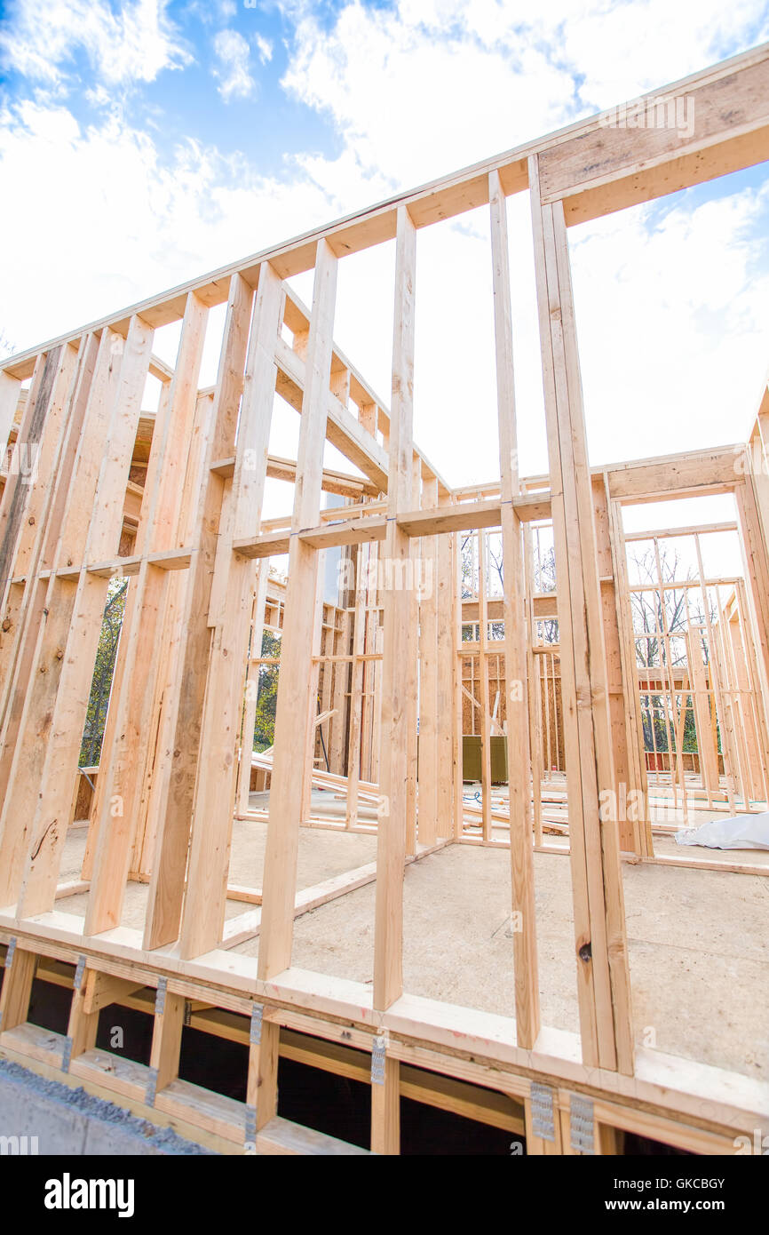 Framing in new home mansion construction - luxury home Stock Photo - Alamy