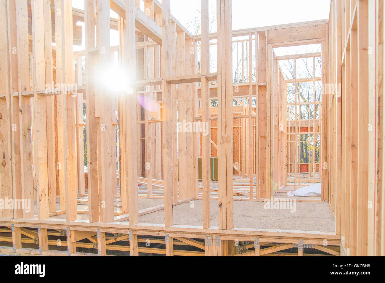 Framing in new home mansion construction - luxury home home with sun ...