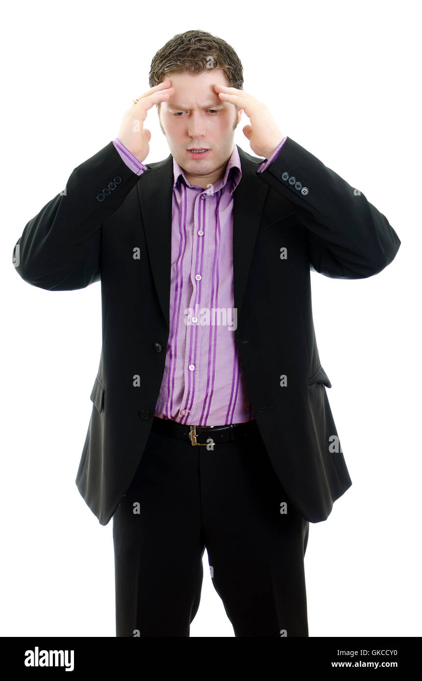 Portrait of a young business man looking depressed from work. Isolated ...