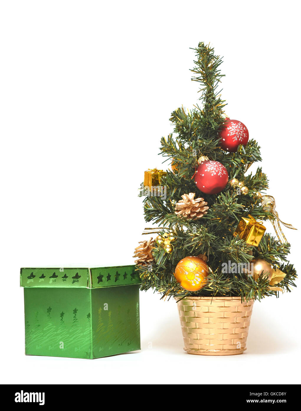 gift box and christmas tree with decorations Stock Photo - Alamy