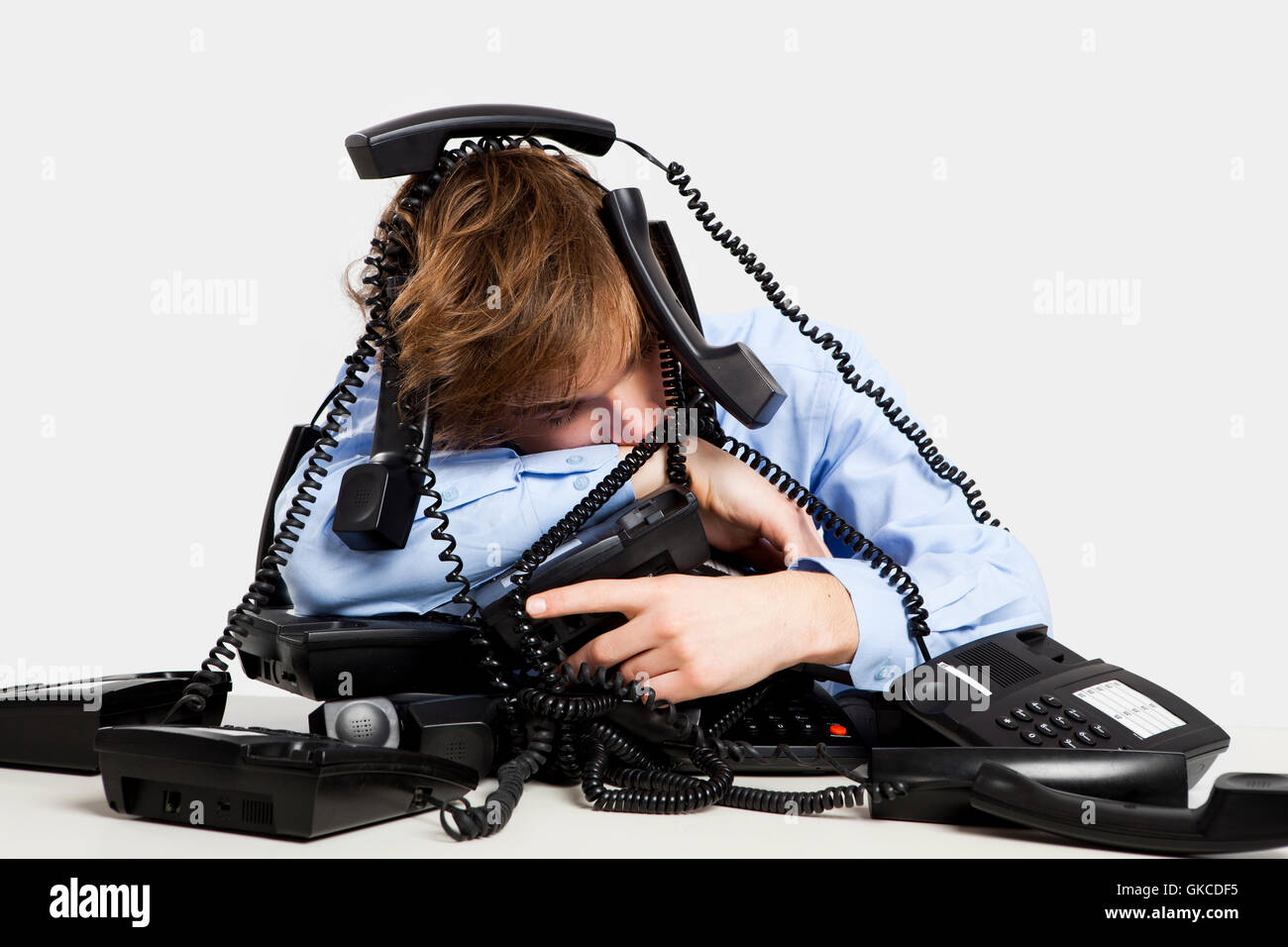 Tired receptionist hi-res stock photography and images - Alamy