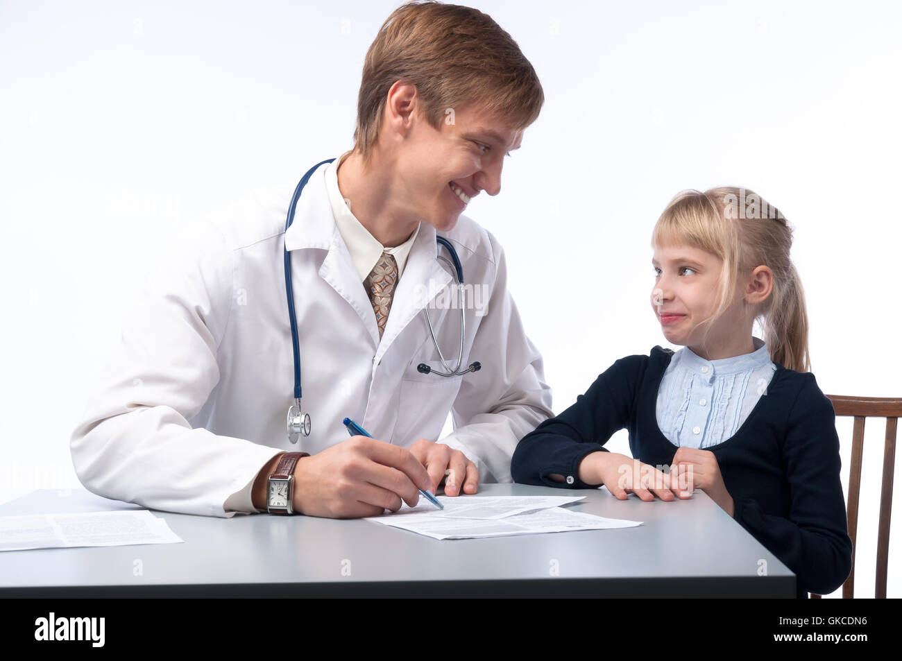 The doctor and the little girl Stock Photo - Alamy