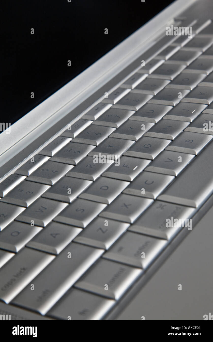 Silver laptop power button hi-res stock photography and images - Alamy