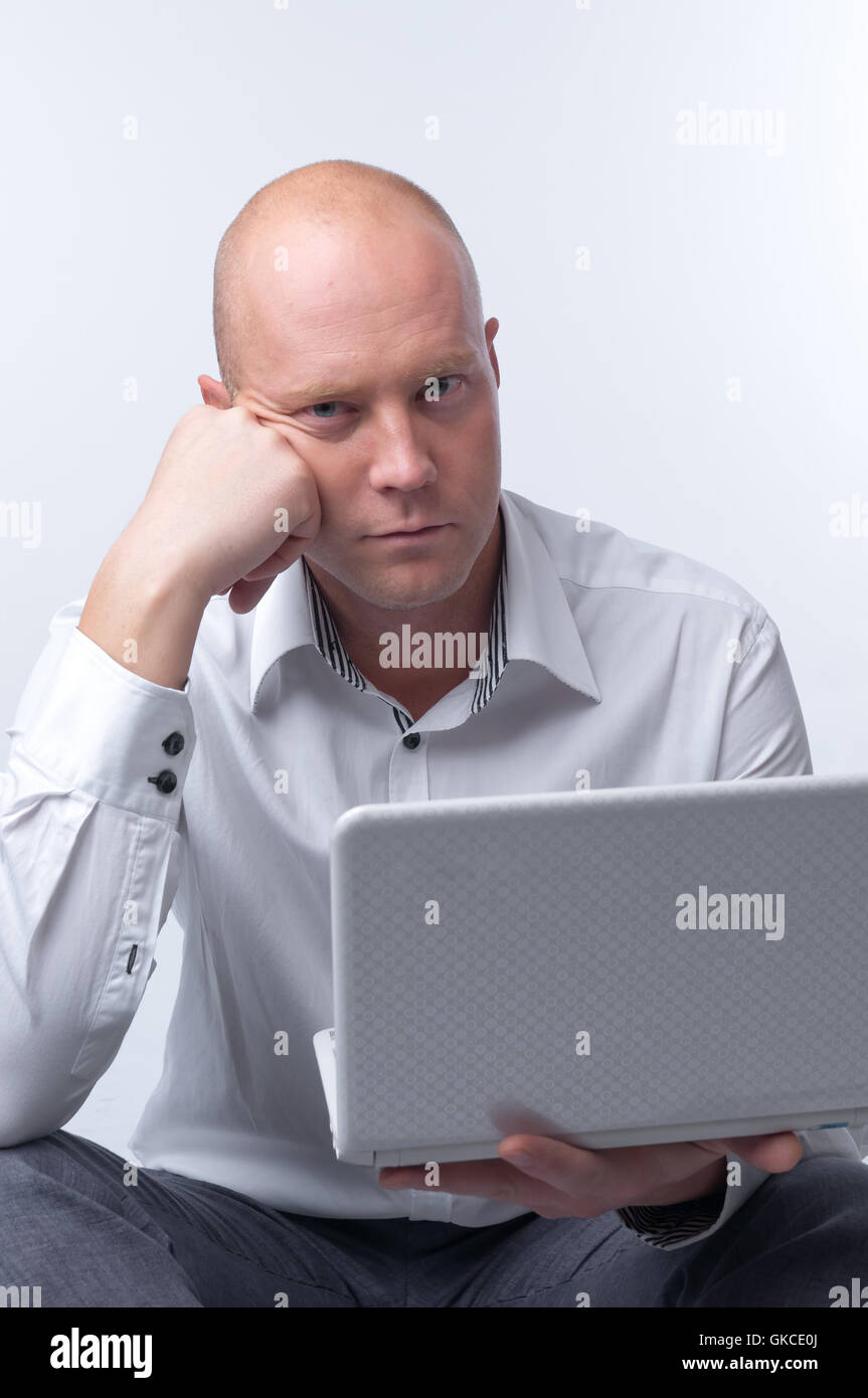 Man with laptop Stock Photo - Alamy