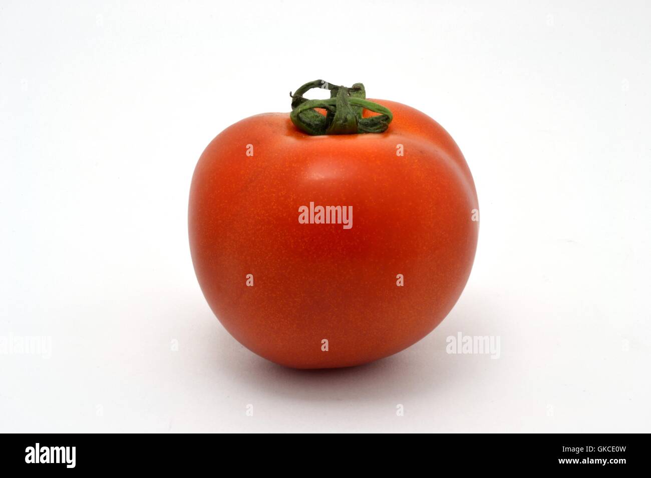 Single fresh tomato hi-res stock photography and images - Alamy