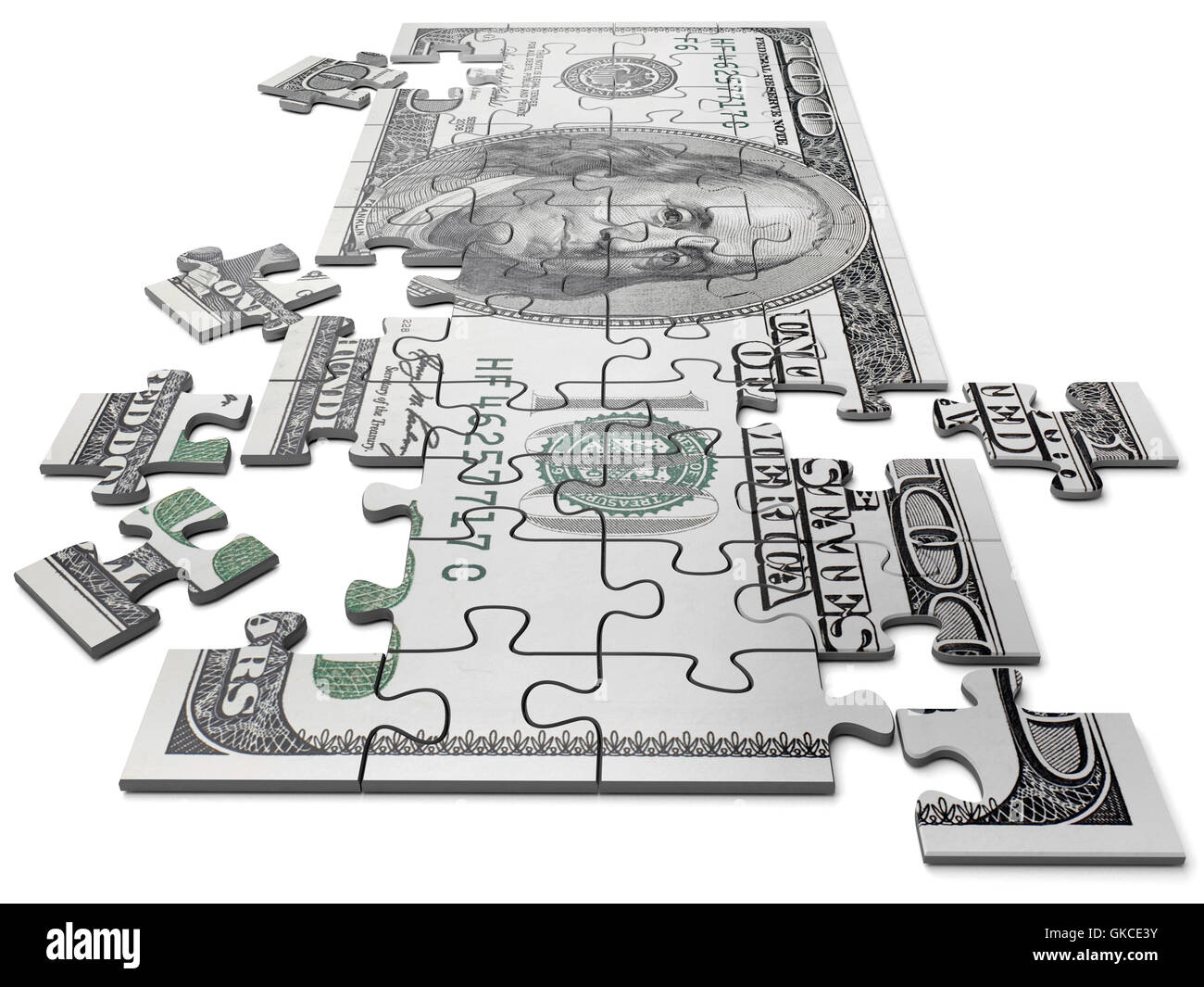 Puzzle in the form of currency of the USA Stock Photo - Alamy
