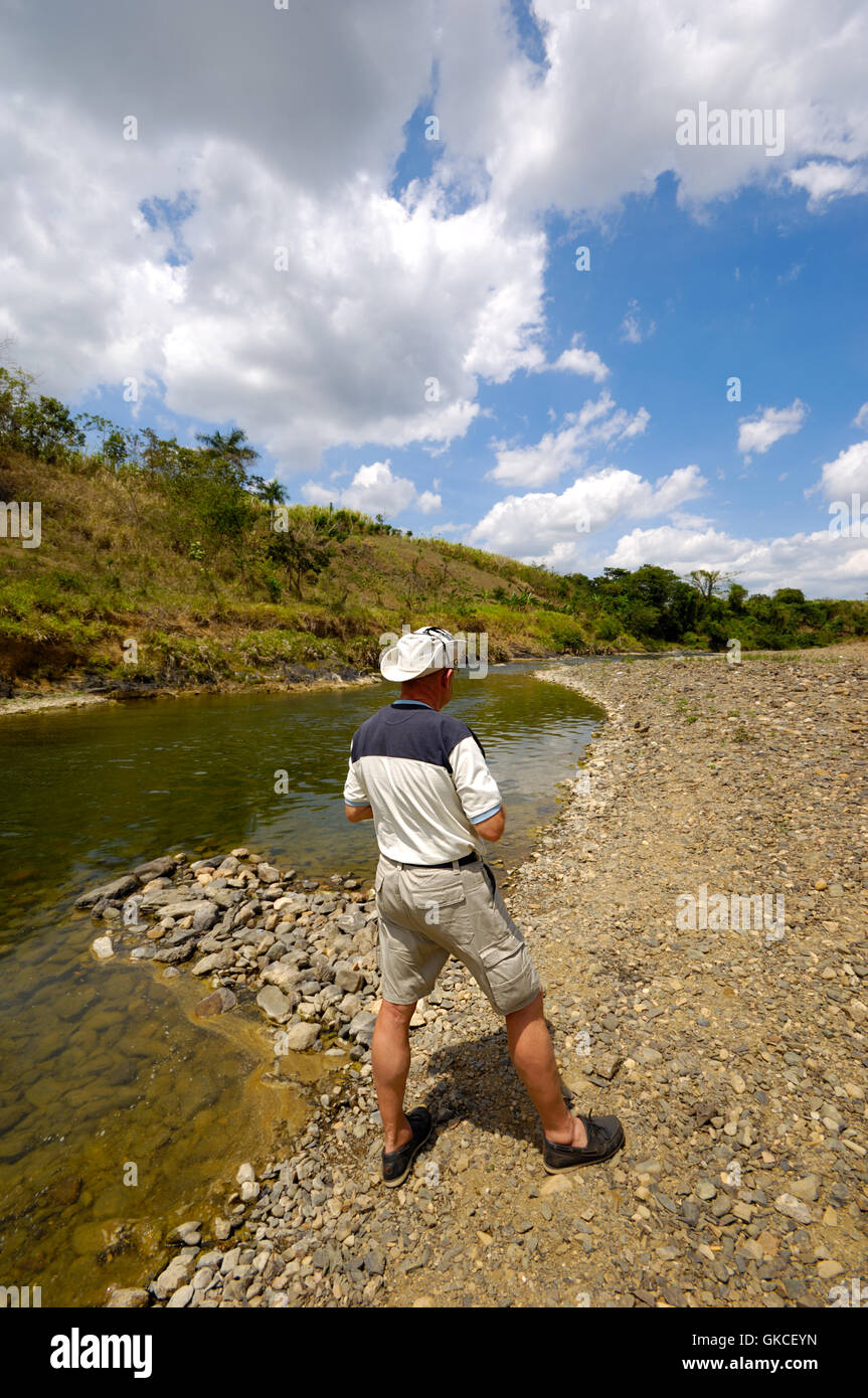Man at river Stock Photo - Alamy