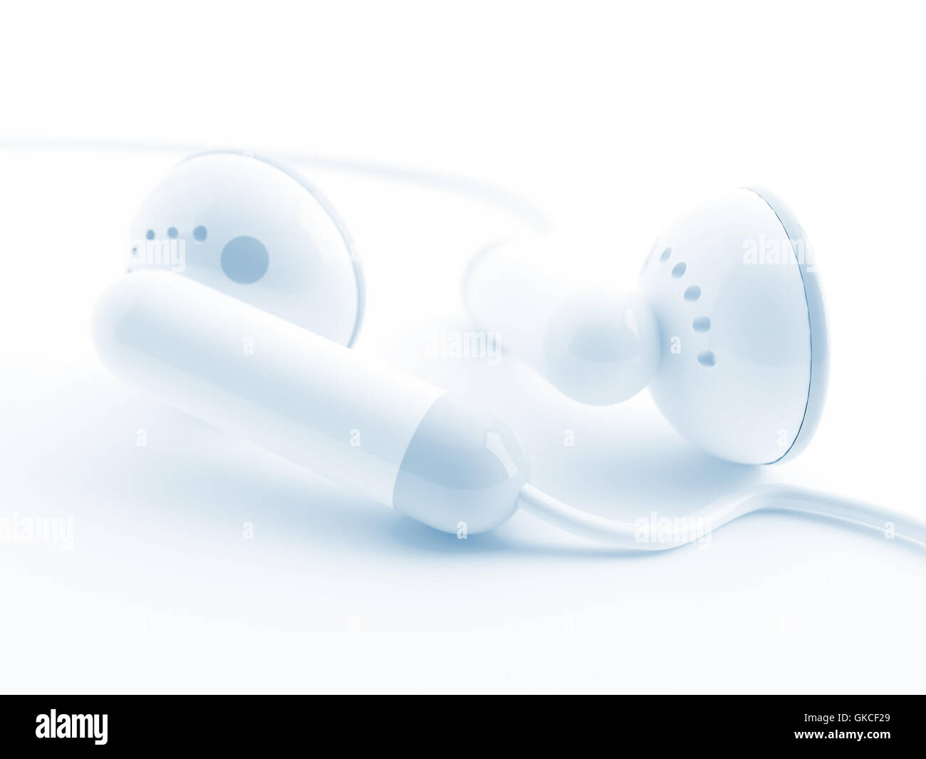 Small ear phones with music Stock Photo - Alamy