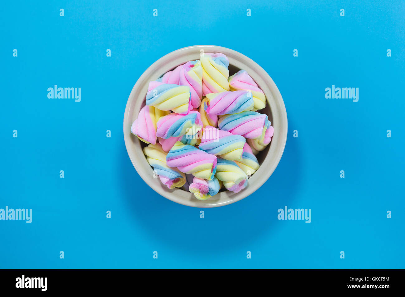 Marshmallow Blue background Stock Photo - Alamy
