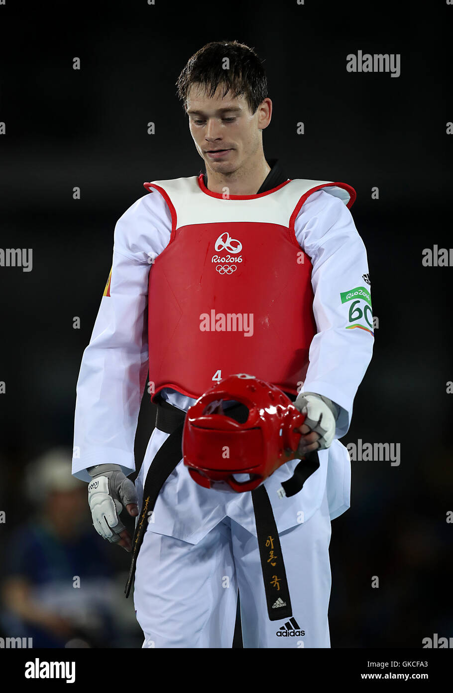 Moldova's Aaron Cook is defeated during his bout against Chinese Taipei ...