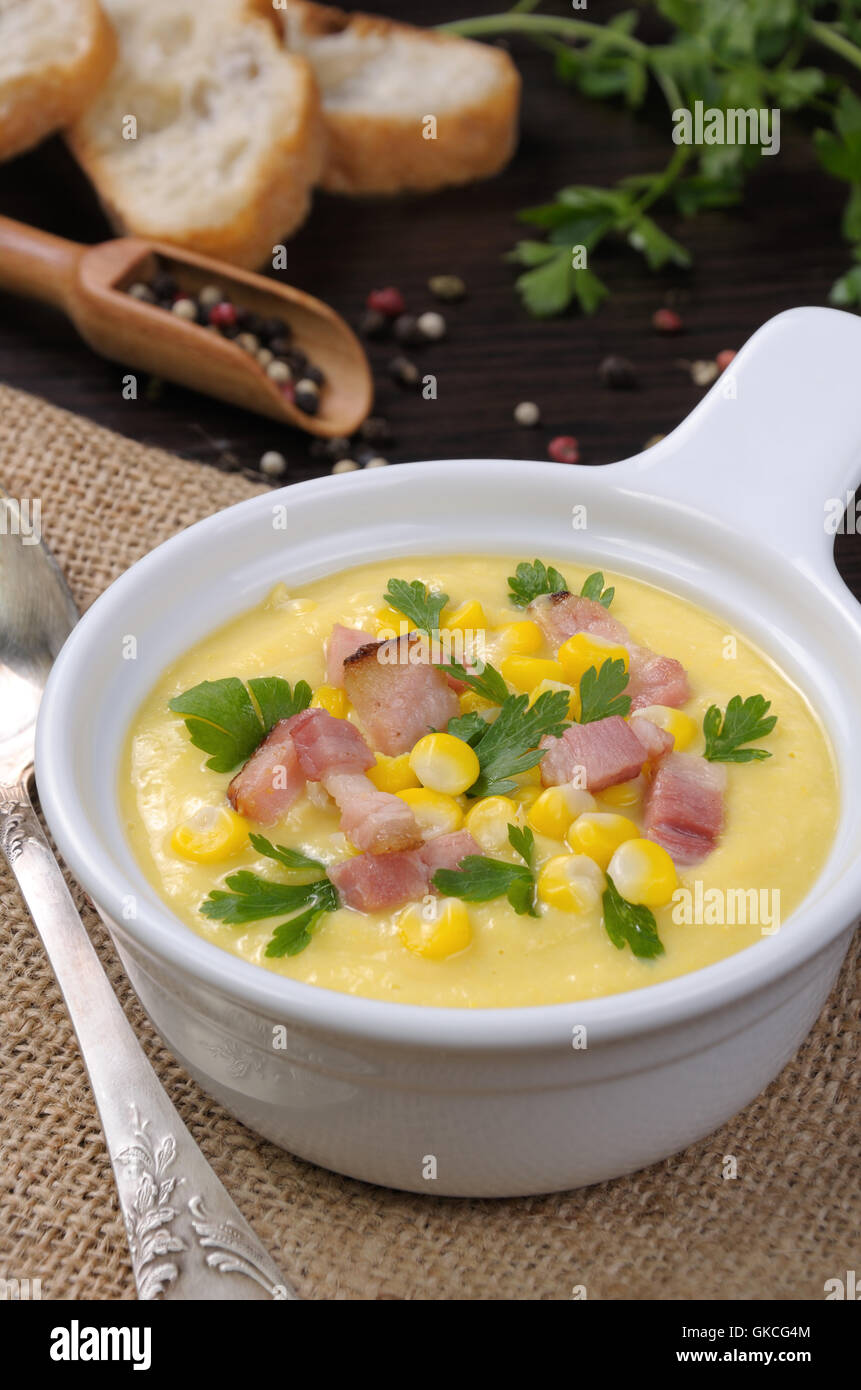 Puree soup of corn with slices of fried bacon with parsley Stock Photo ...