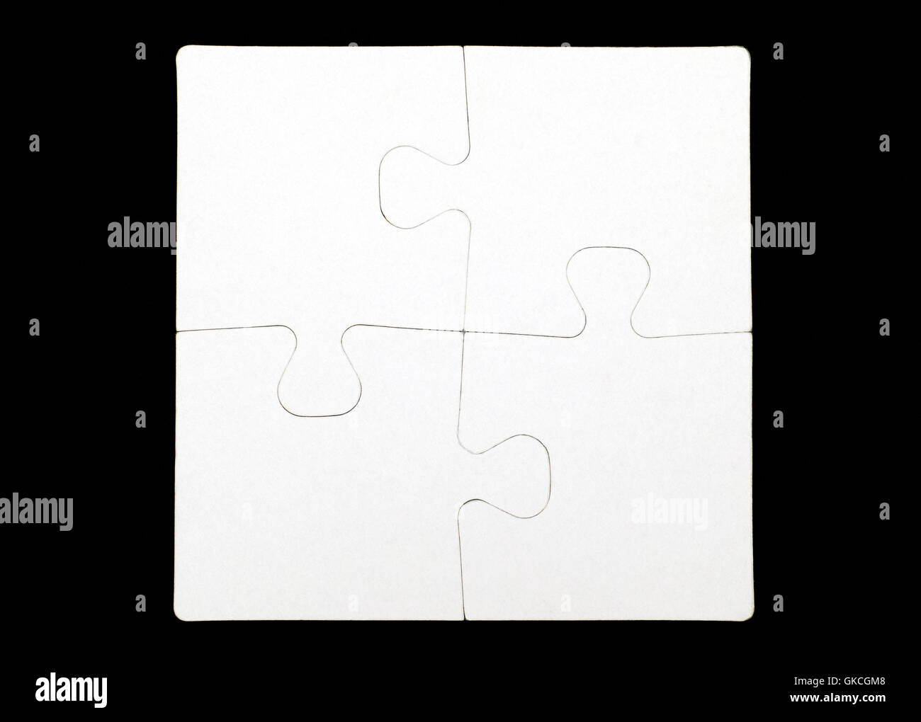 Four pieces of puzzle are connected together on black background Stock ...