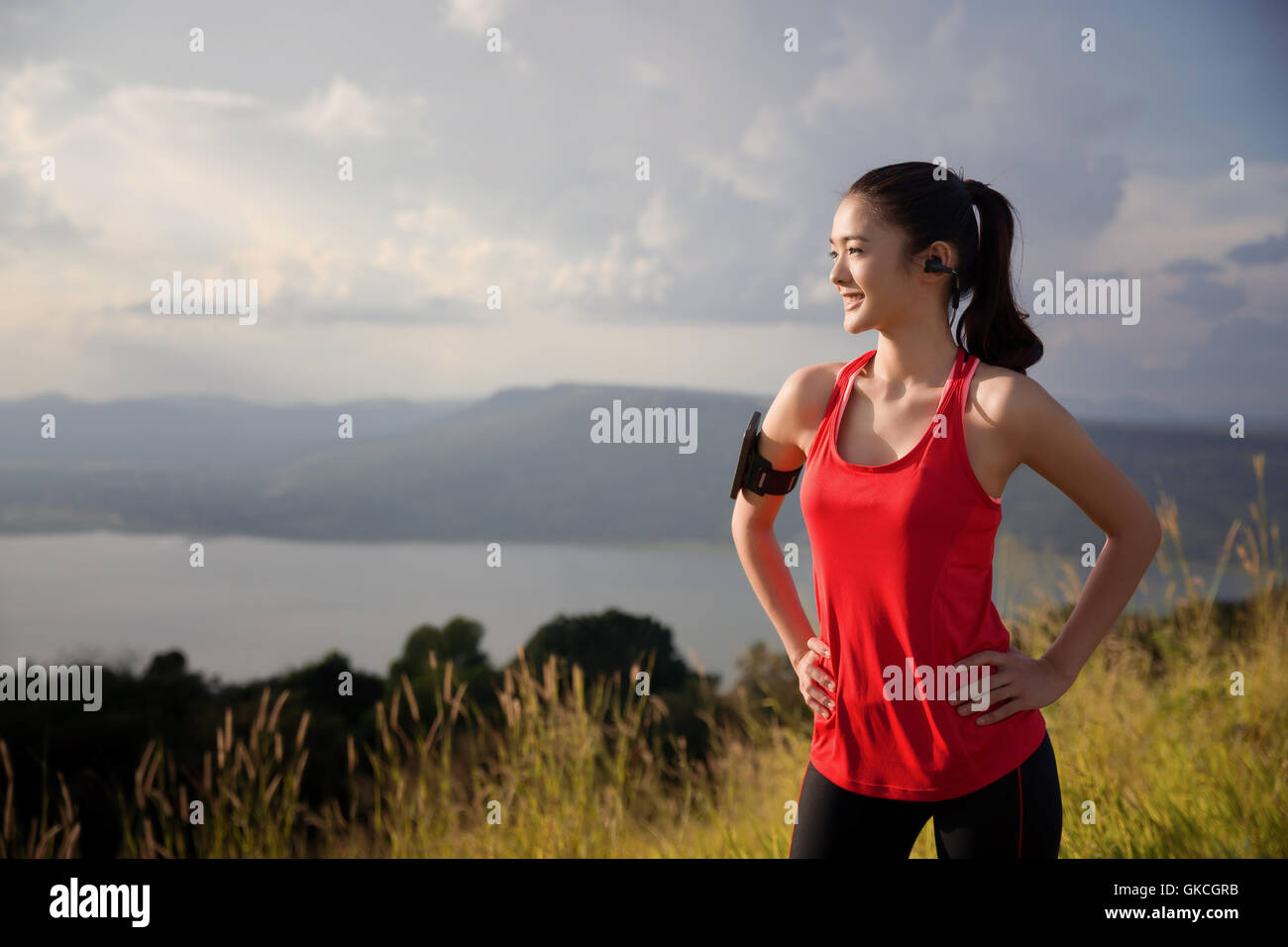 Asian women are relaxing out of the running exercise. She is looking ...