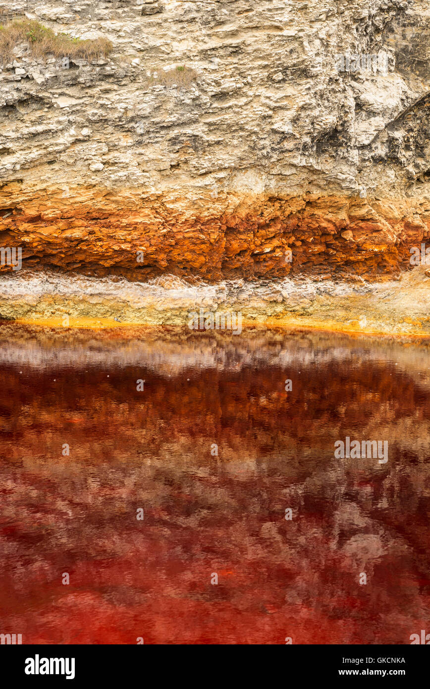 Water polluted from the residue of waste material from coal mining ...