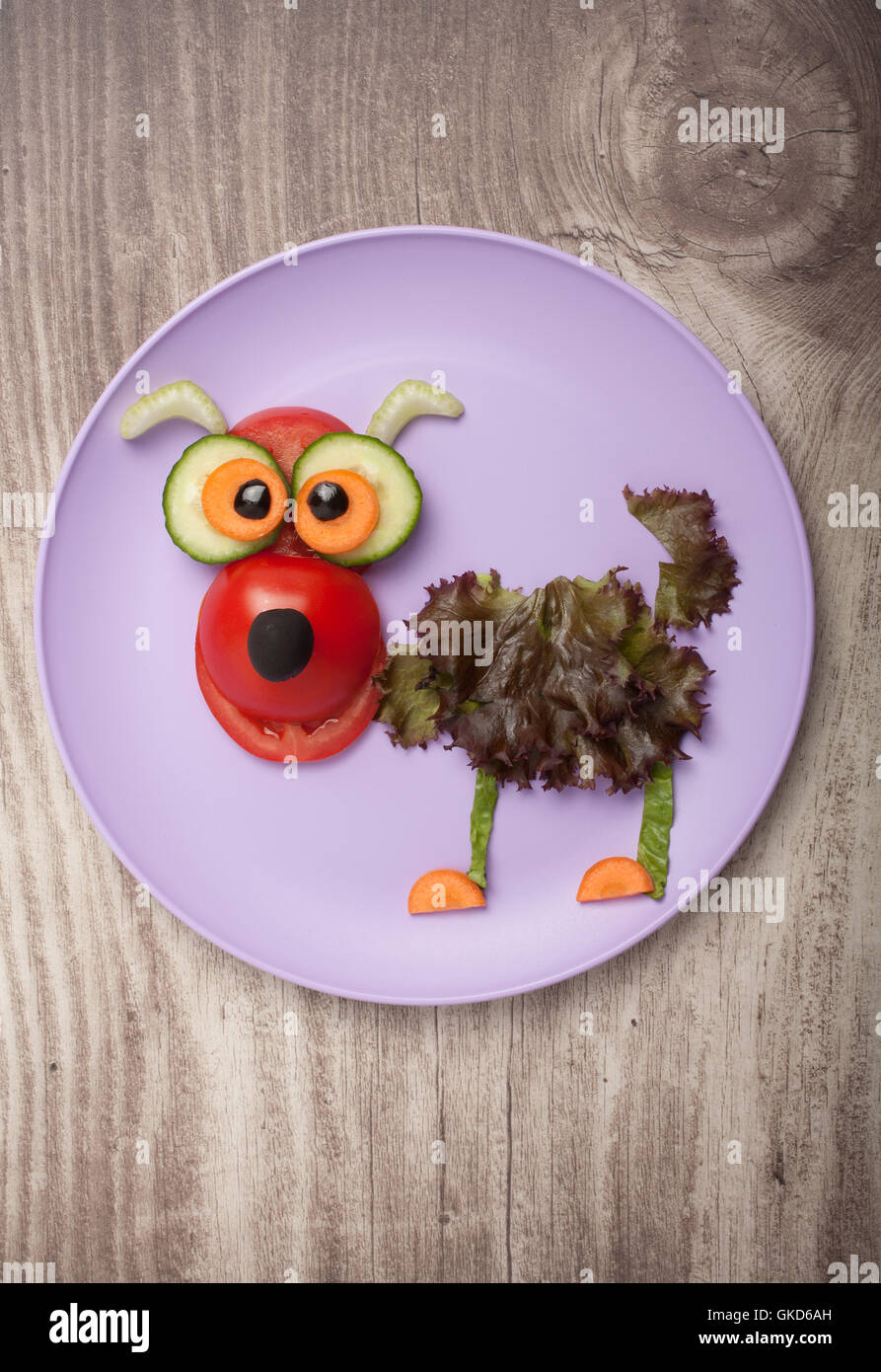 Funny dog made of vegetables on plate and board Stock Photo - Alamy