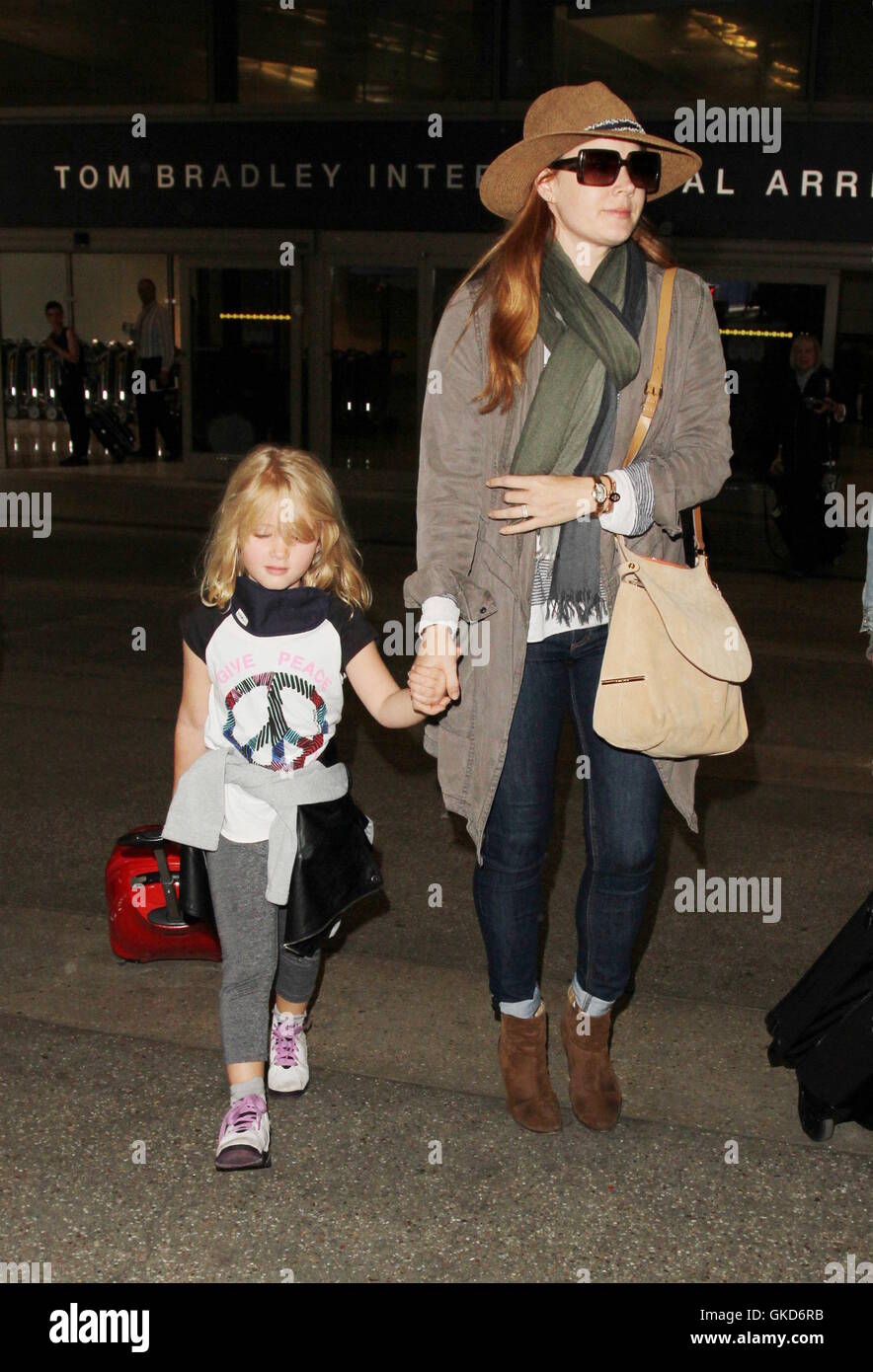 Amy Adams and her daughter arrive at Los Angeles International Airport ...
